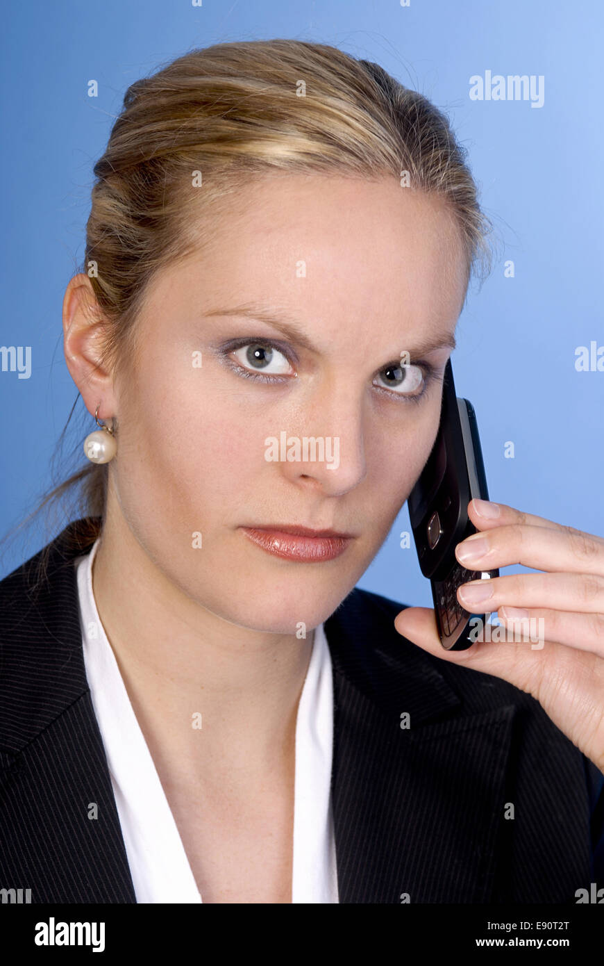 Young woman phoning Stock Photo - Alamy
