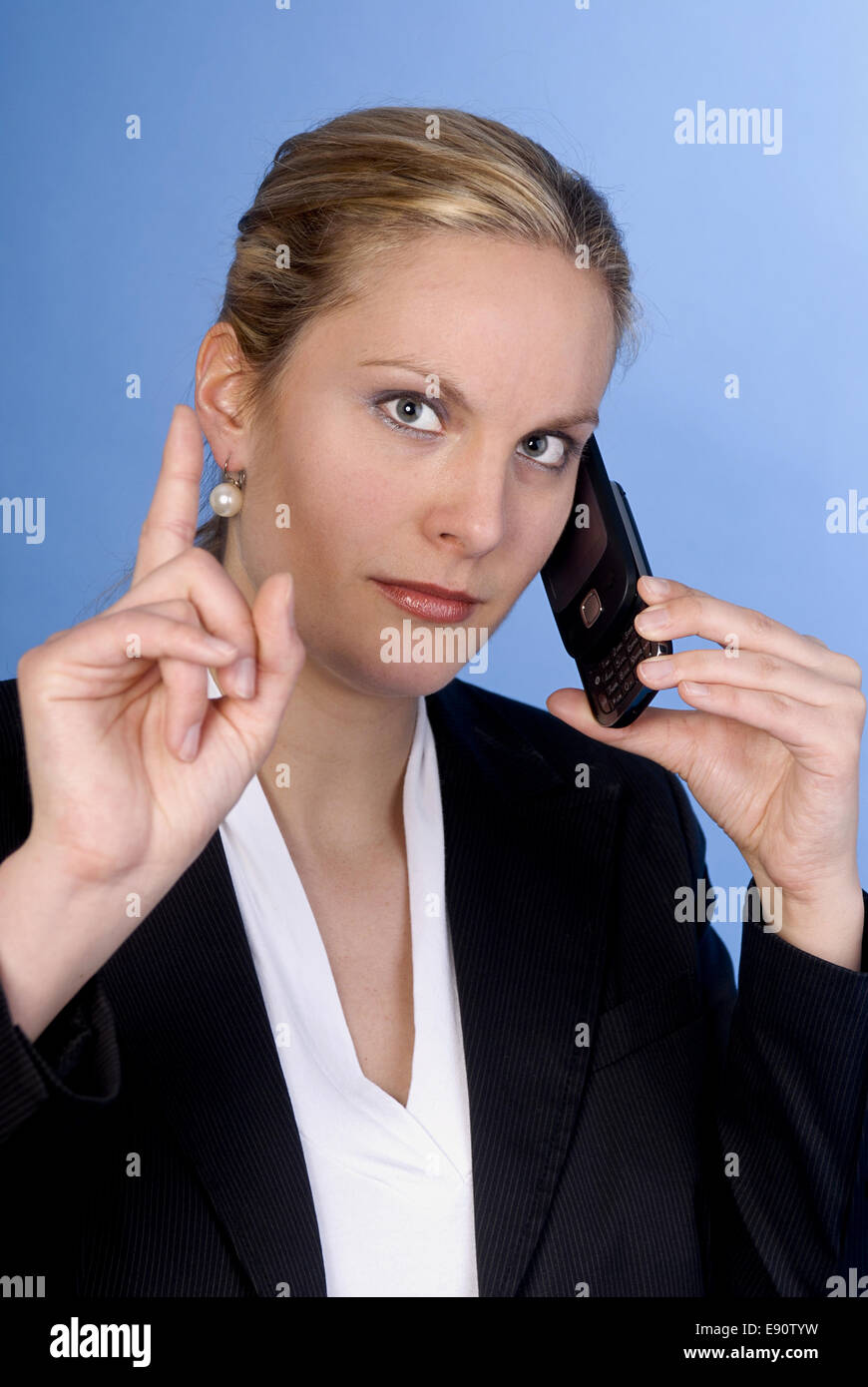Young woman phoning Stock Photo - Alamy