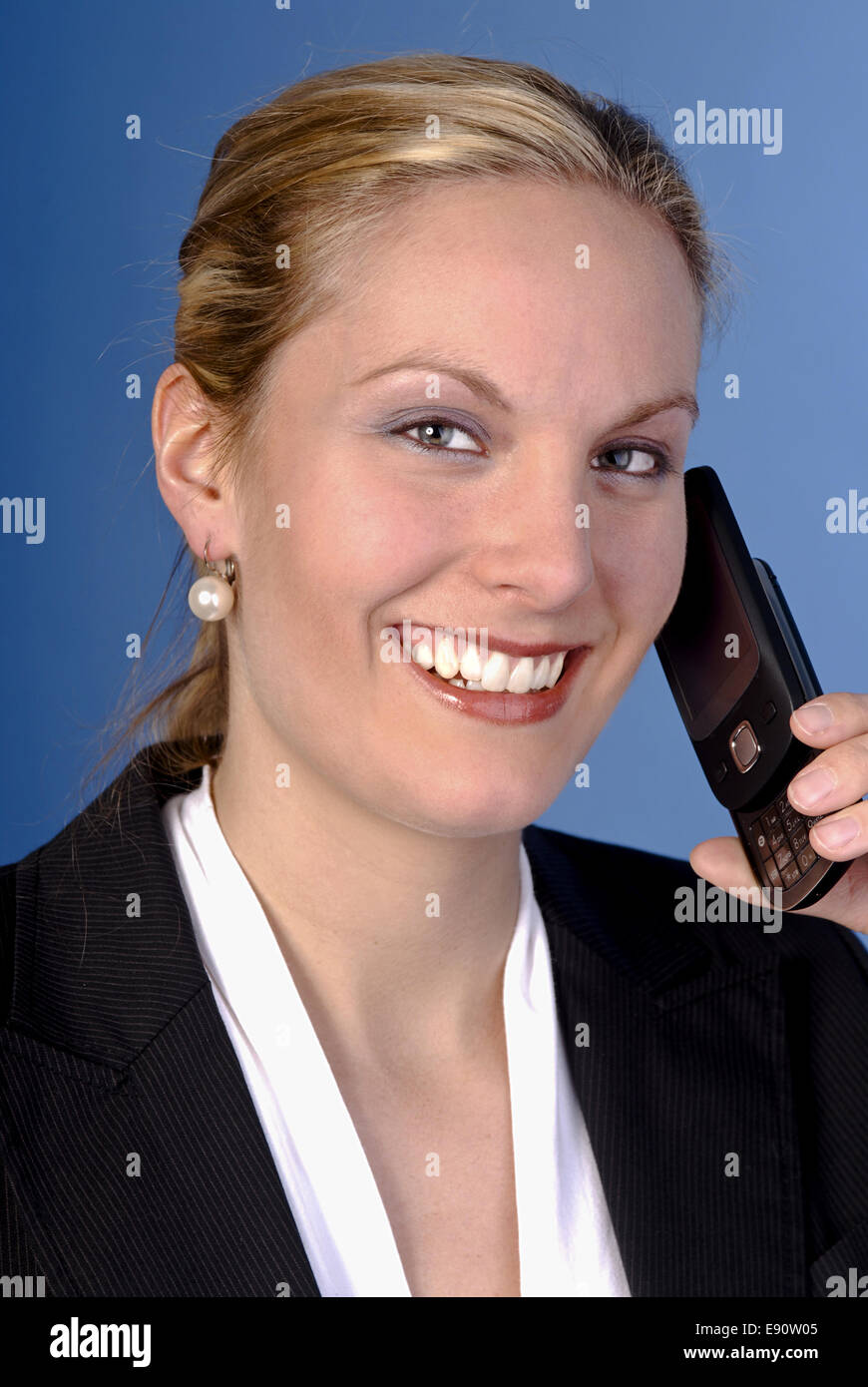 Young woman phoning Stock Photo - Alamy