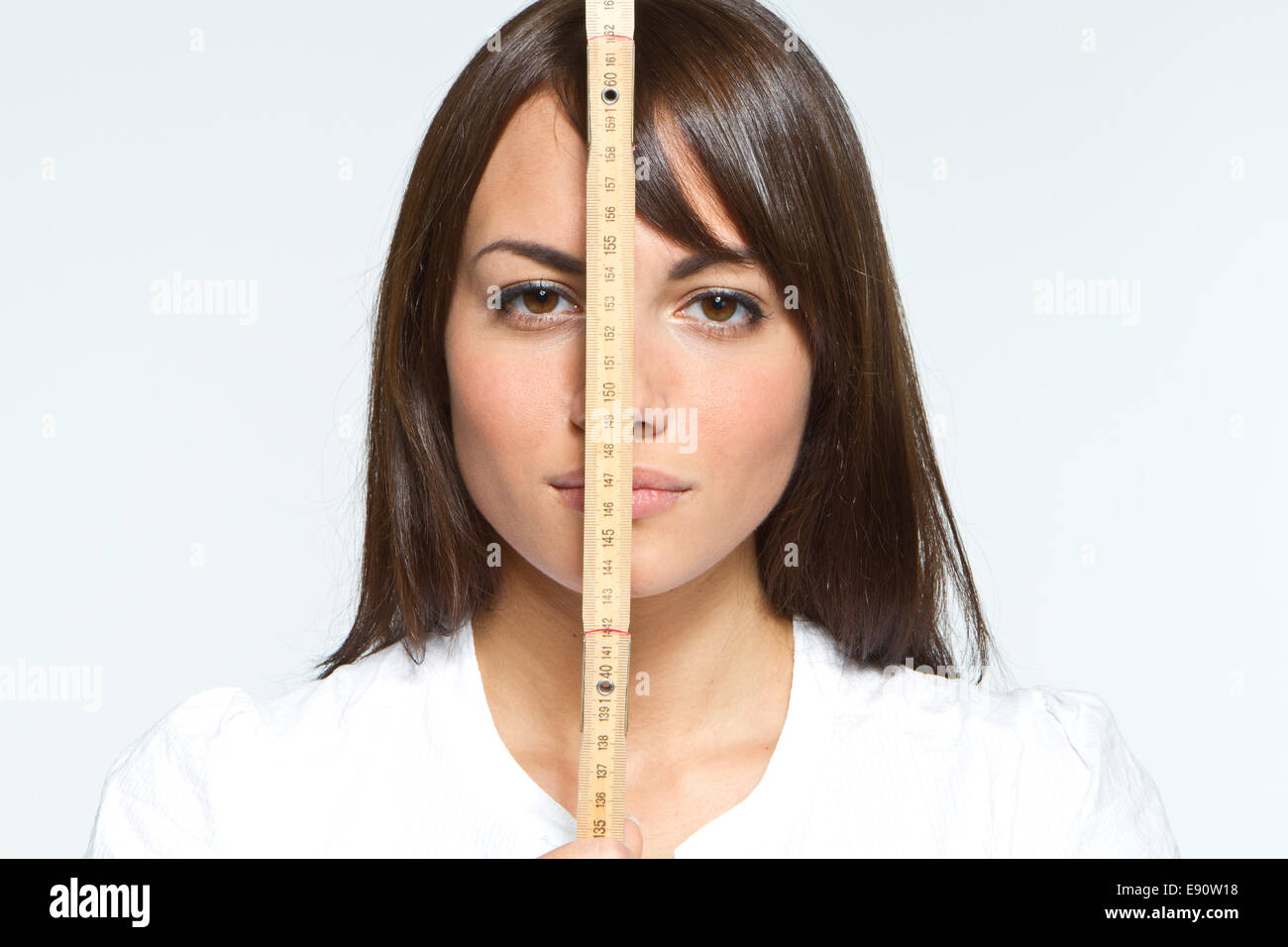 Woman measure height hi-res stock photography and images - Alamy