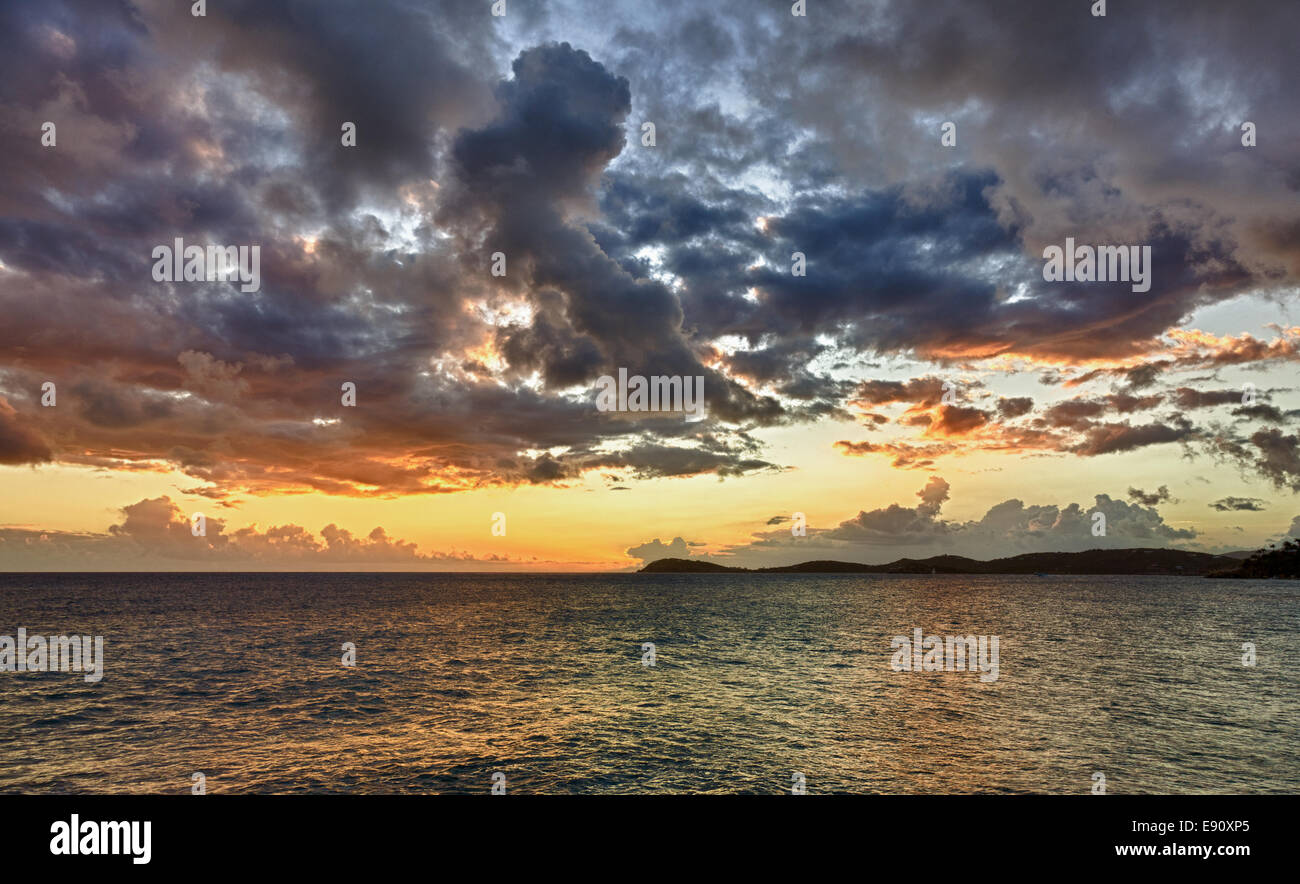 Sunset over the ocean Stock Photo - Alamy