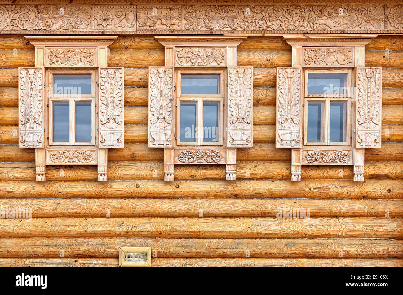 The windows on the facade of the wooden house. Old Russian country ...