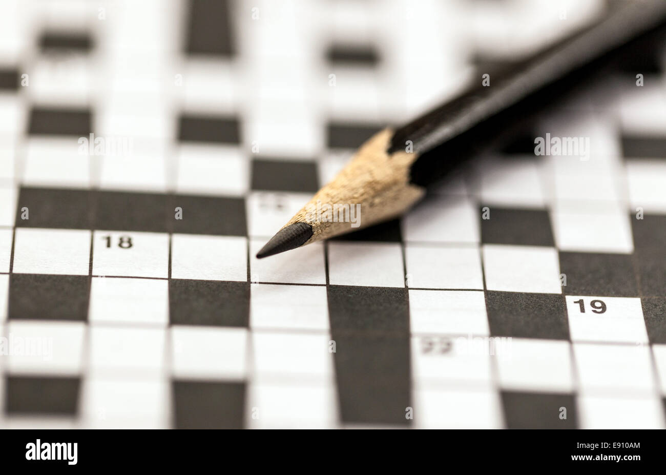 Crossword puzzle and a pencil Stock Photo - Alamy