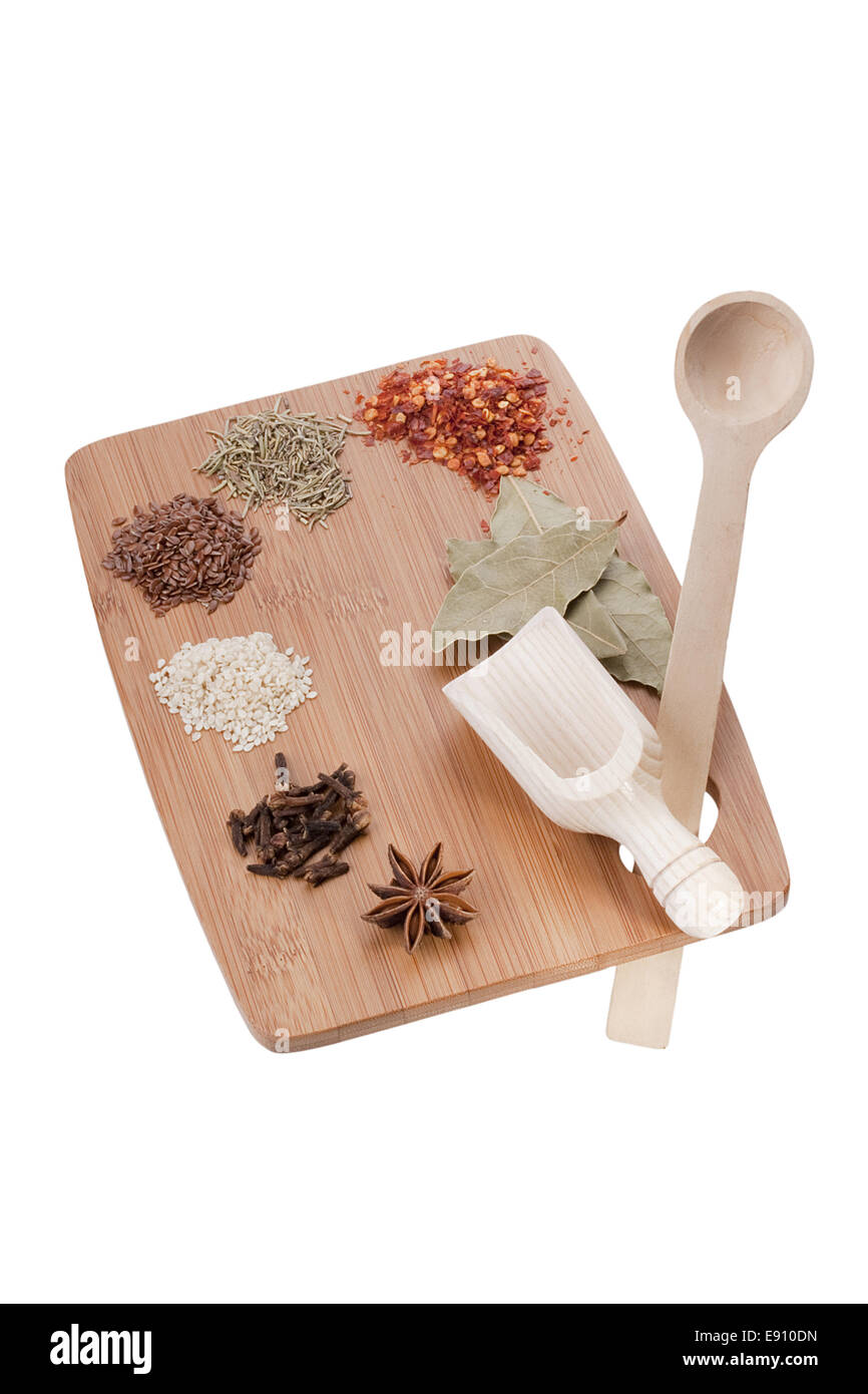 Kitchen board with spices Stock Photo - Alamy