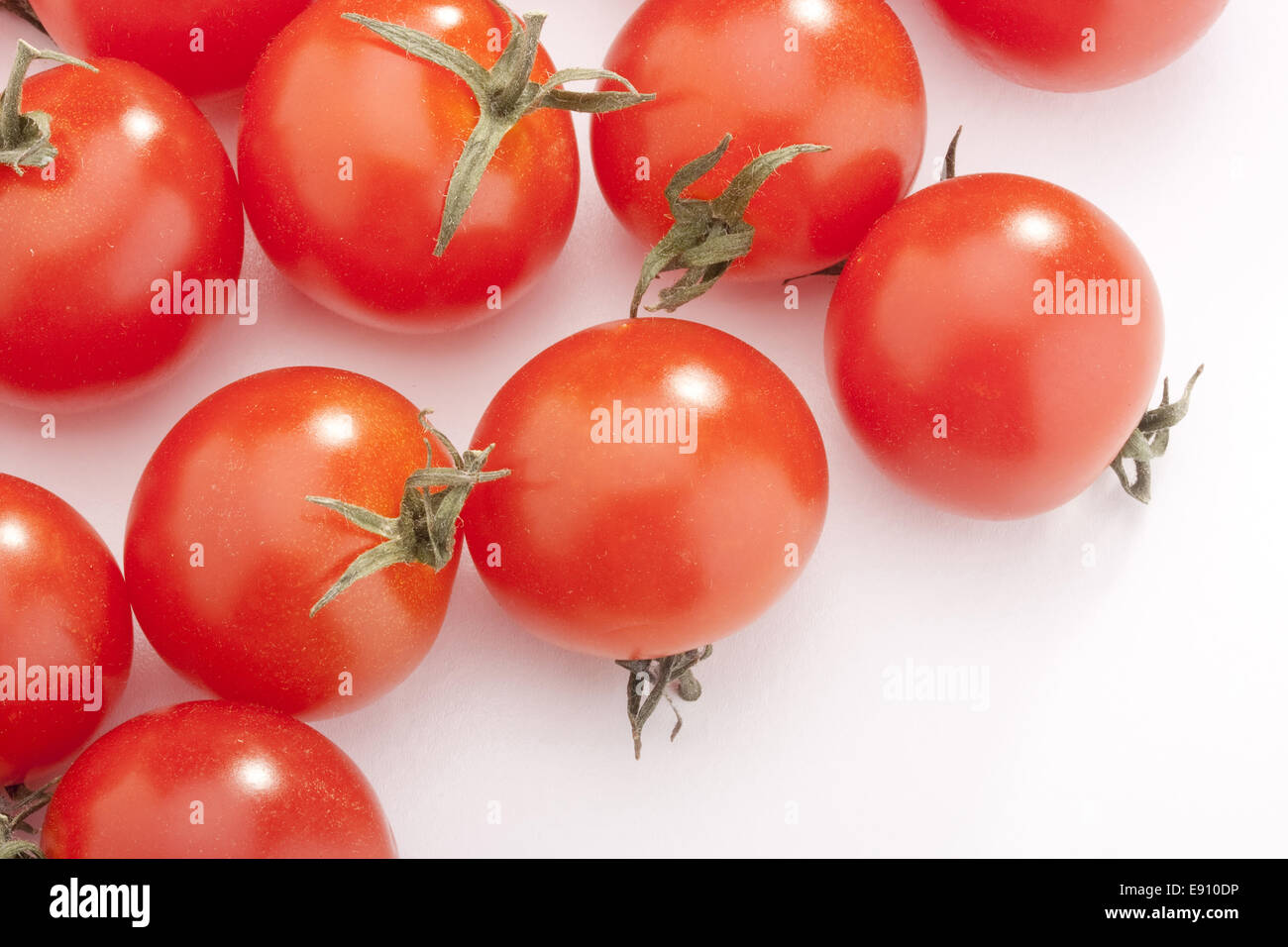 Small red tomatoes Stock Photo - Alamy