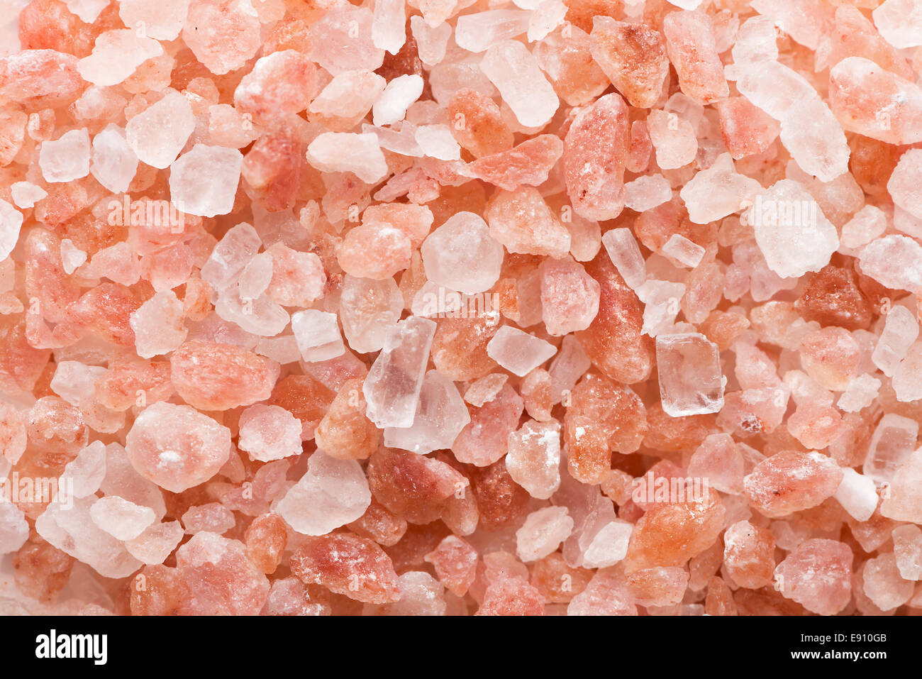Pink Himalayan salt crystals closeup background Stock Photo - Alamy