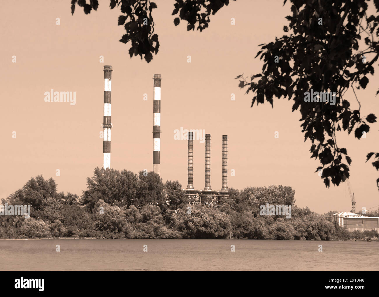 Factory by river Stock Photo - Alamy