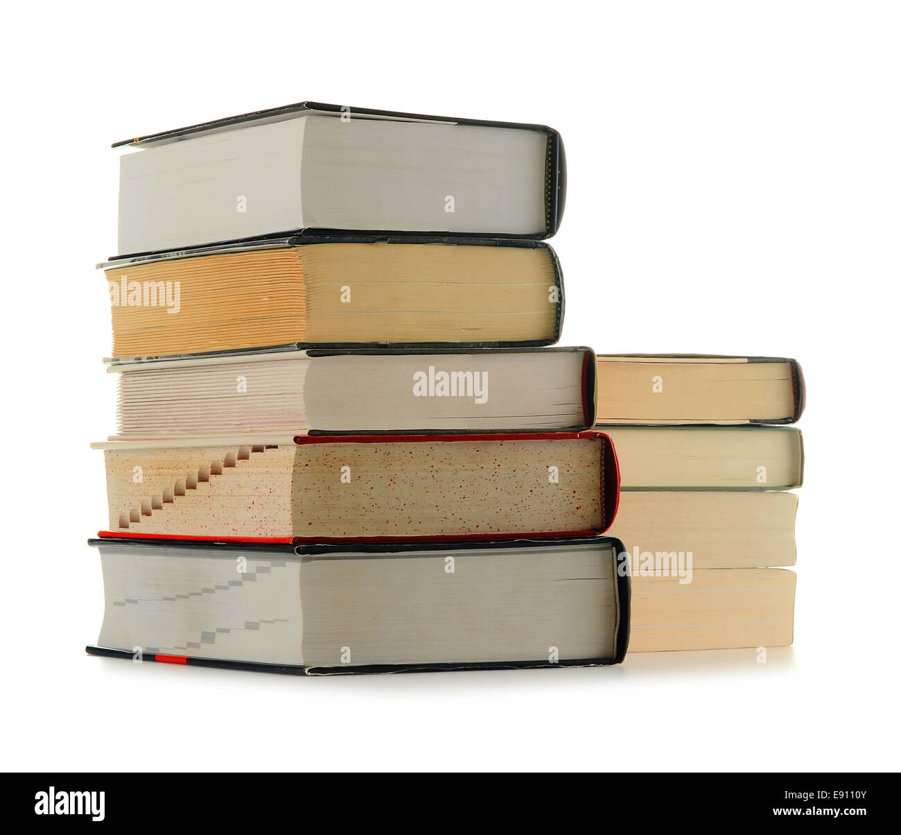 Composition with stack of books on white Stock Photo - Alamy