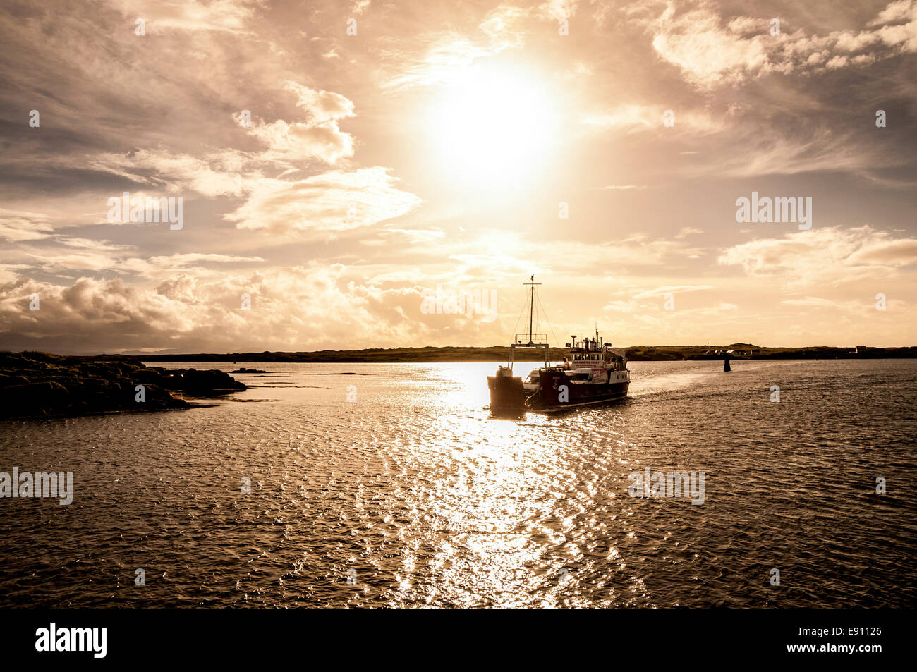 Arranmore Island ferry returns to Burtonport harbour in County Donegal ...