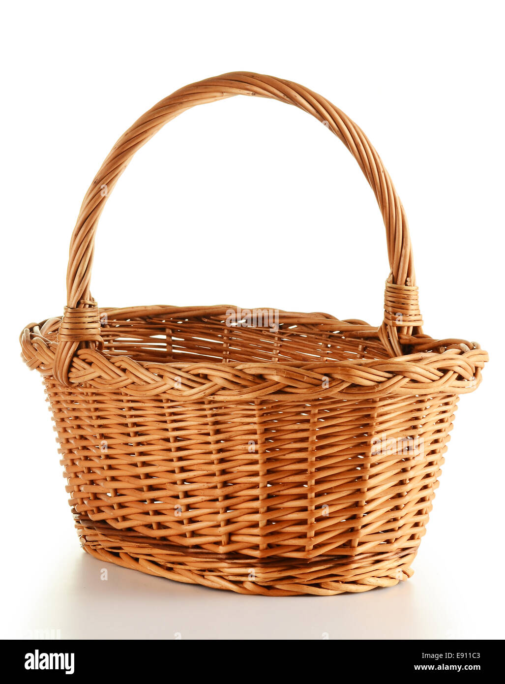 Empty wicker baskets isolated on white Stock Photo - Alamy