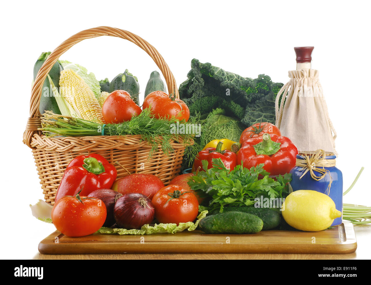 Vegetables and wicker basket Stock Photo - Alamy