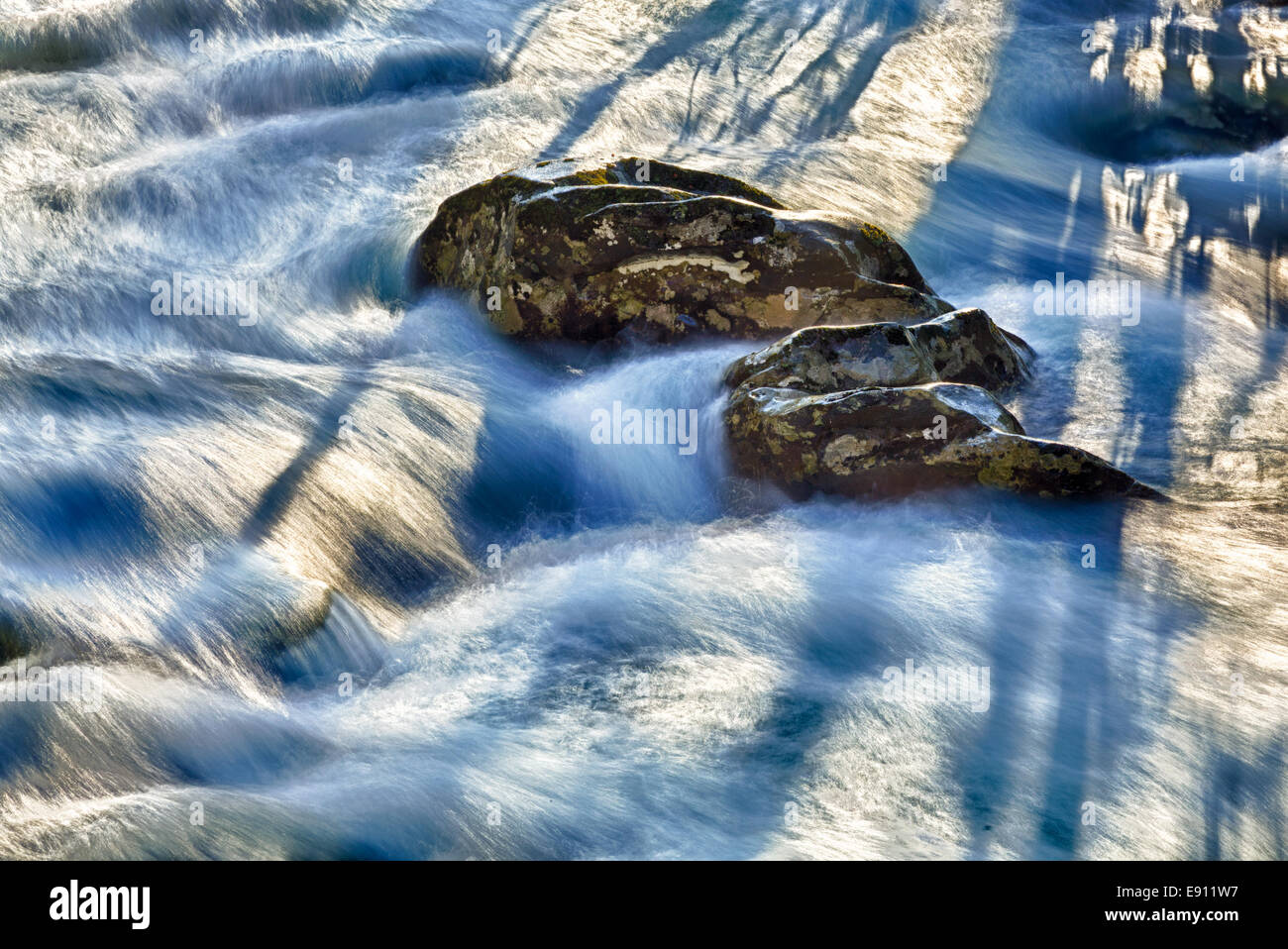 Raging river flows around rocks Stock Photo - Alamy Raging river flows around rocks Stock Photo - Alamy