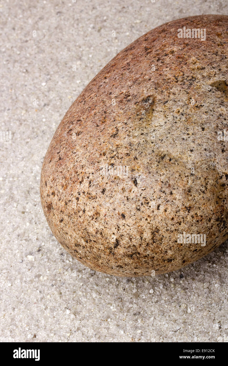 Stone on the Sand Stock Photo - Alamy