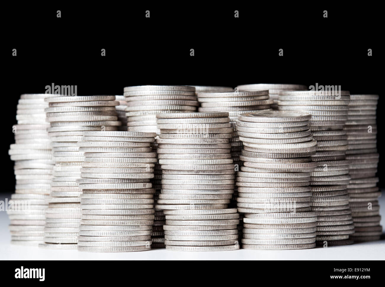 Stacks of pure silver coins Stock Photo - Alamy