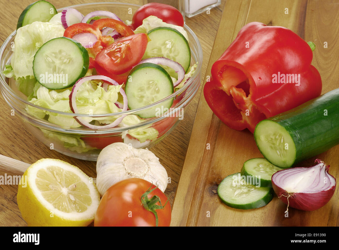 Vegetable salad bowl and salad ingredients Stock Photo - Alamy
