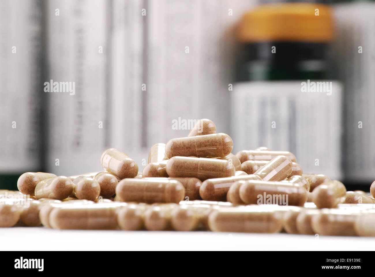 Dietary supplement capsules and containers Stock Photo - Alamy