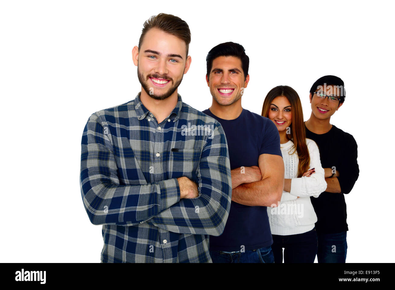 Cheerful young students standing in a row over white background Stock ...