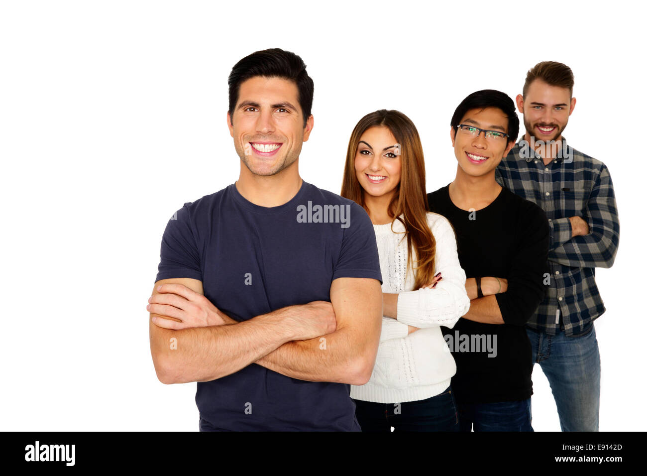 Smiling young friends standing in a row over white background Stock ...