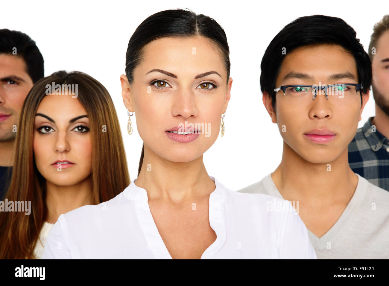 Group of a young people standing over white background Stock Photo - Alamy