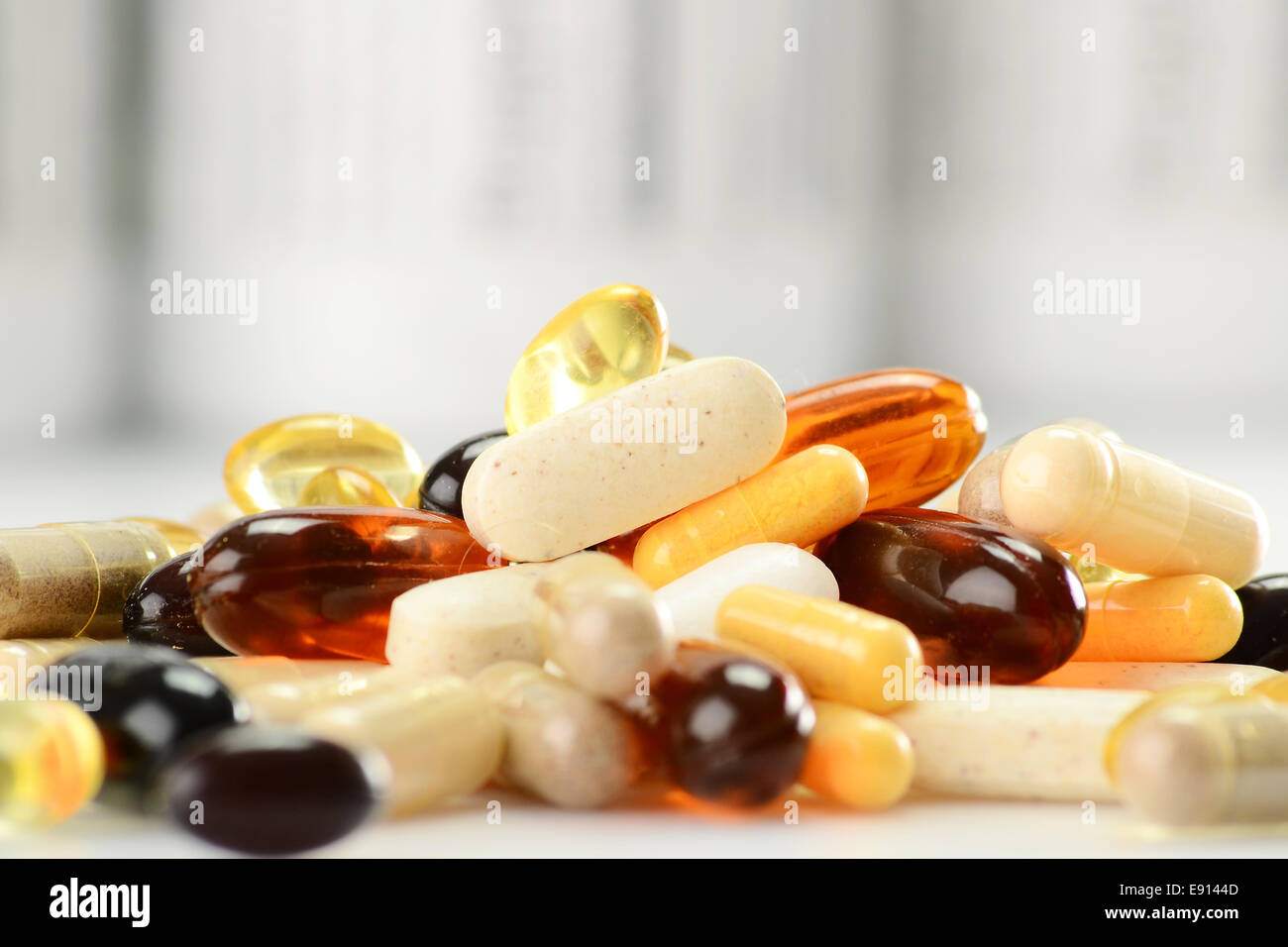 Dietary supplement capsules and containers Stock Photo - Alamy