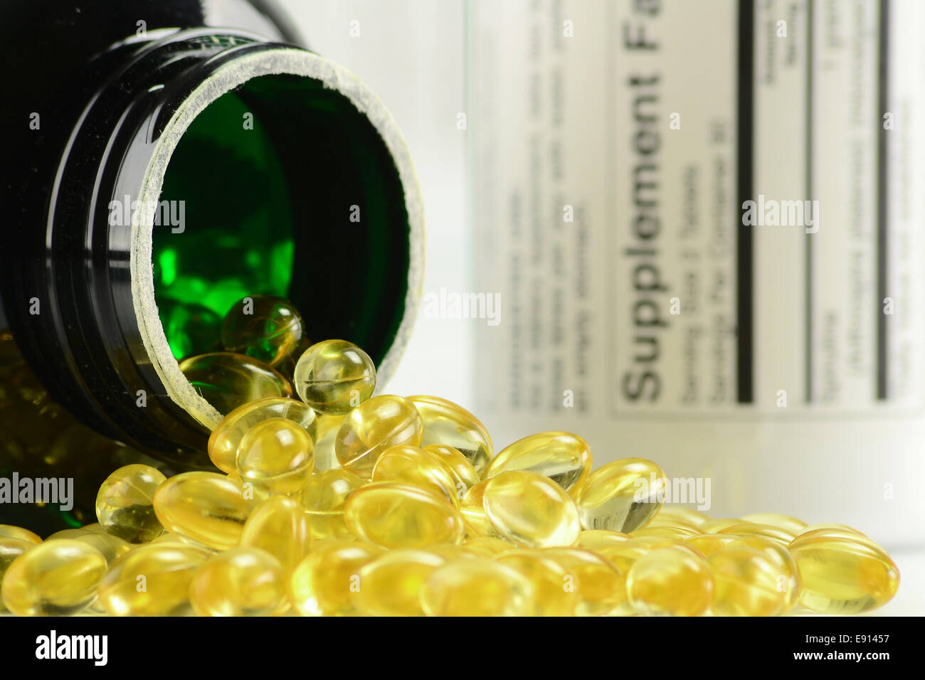 Dietary supplement capsules and containers Stock Photo - Alamy