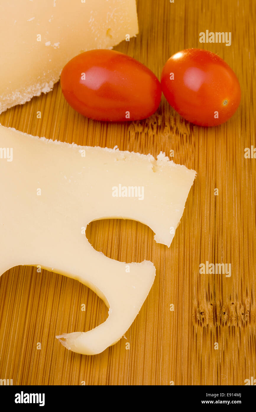 Cheese slice and red tomato Stock Photo - Alamy