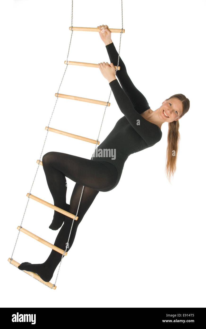 Woman climbing on ladder Cut Out Stock Images & Pictures - Alamy