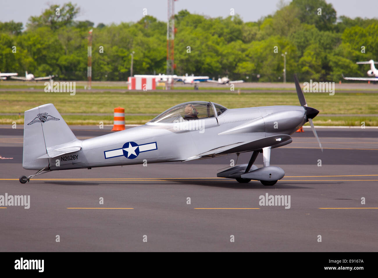 Small military plane on runway Stock Photo - Alamy