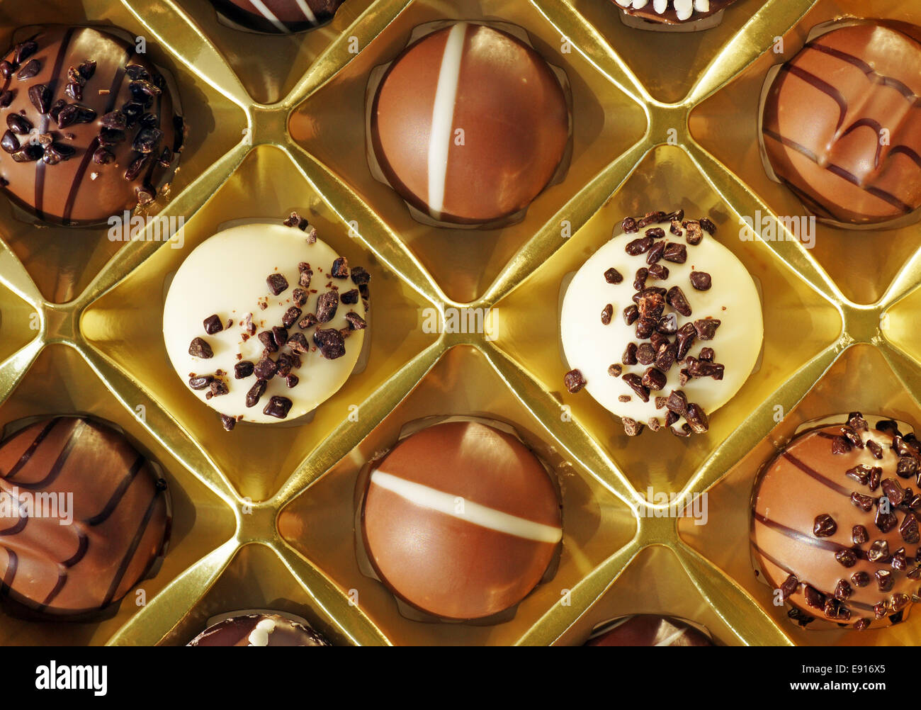 Chocolate in golden Box Stock Photo - Alamy