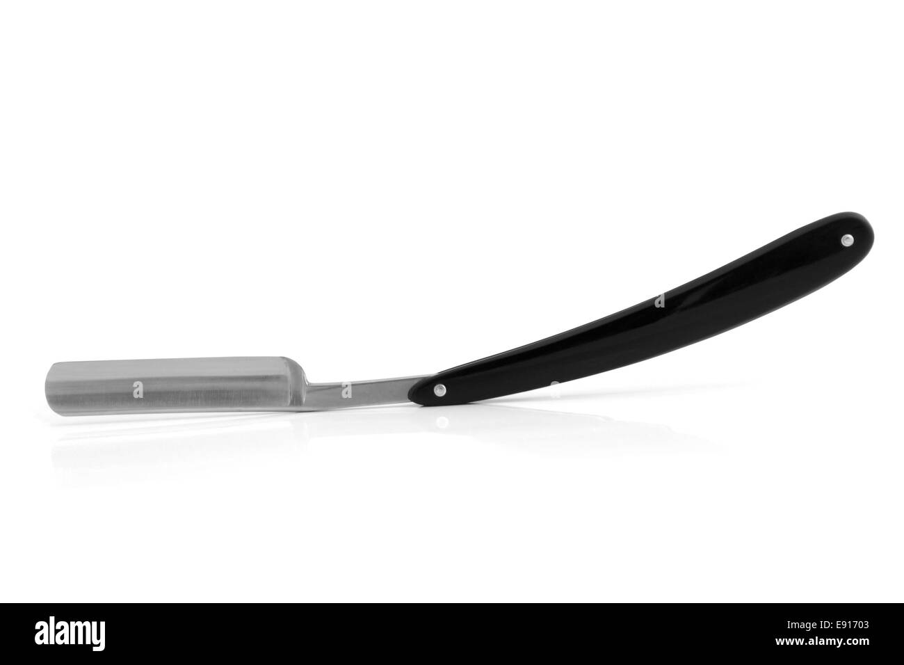 Hairdresser old fashioned razor Cut Out Stock Images & Pictures - Alamy