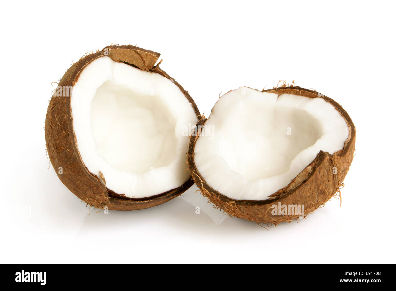 Two halves of coconut Stock Photo - Alamy