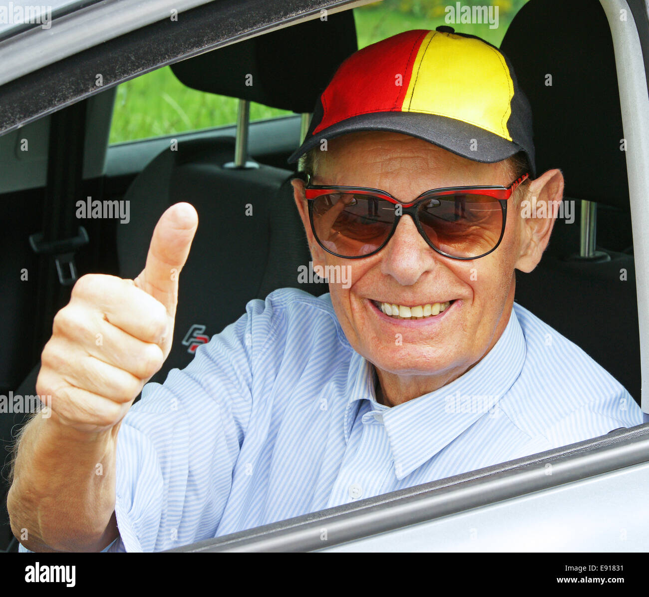 Active Senior with Car - Thumbs up Stock Photo - Alamy