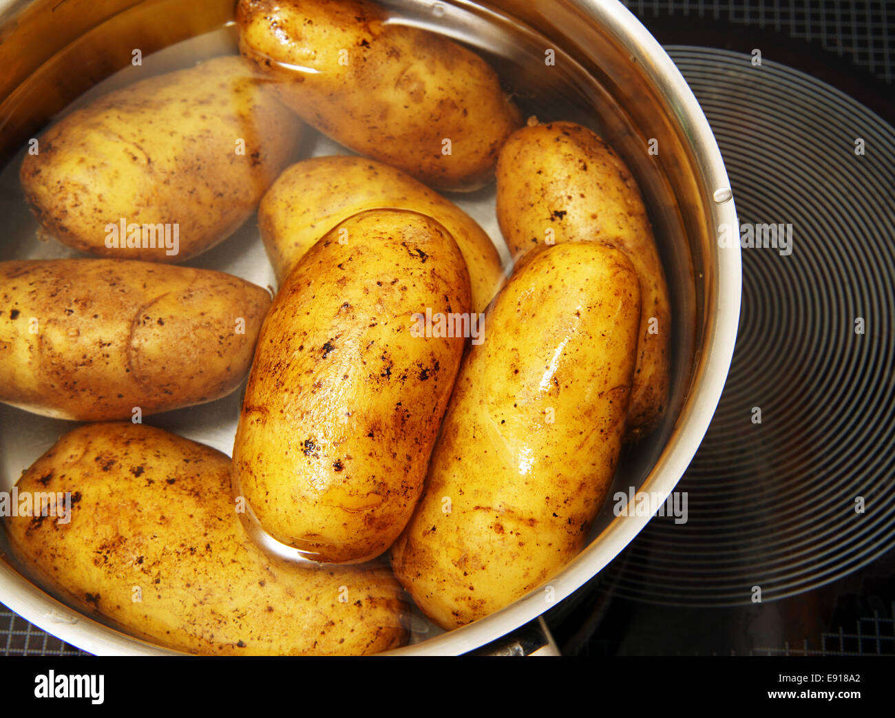 Cooking Potatoas in Kitchen Stock Photo - Alamy