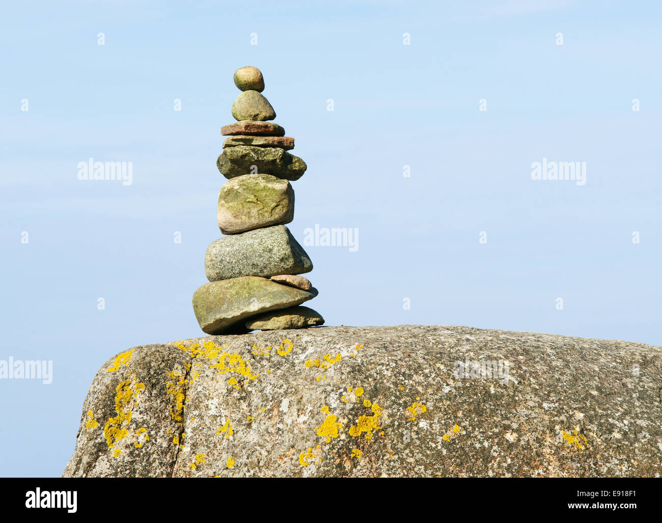 Rock with Stone Pyramid Stock Photo - Alamy