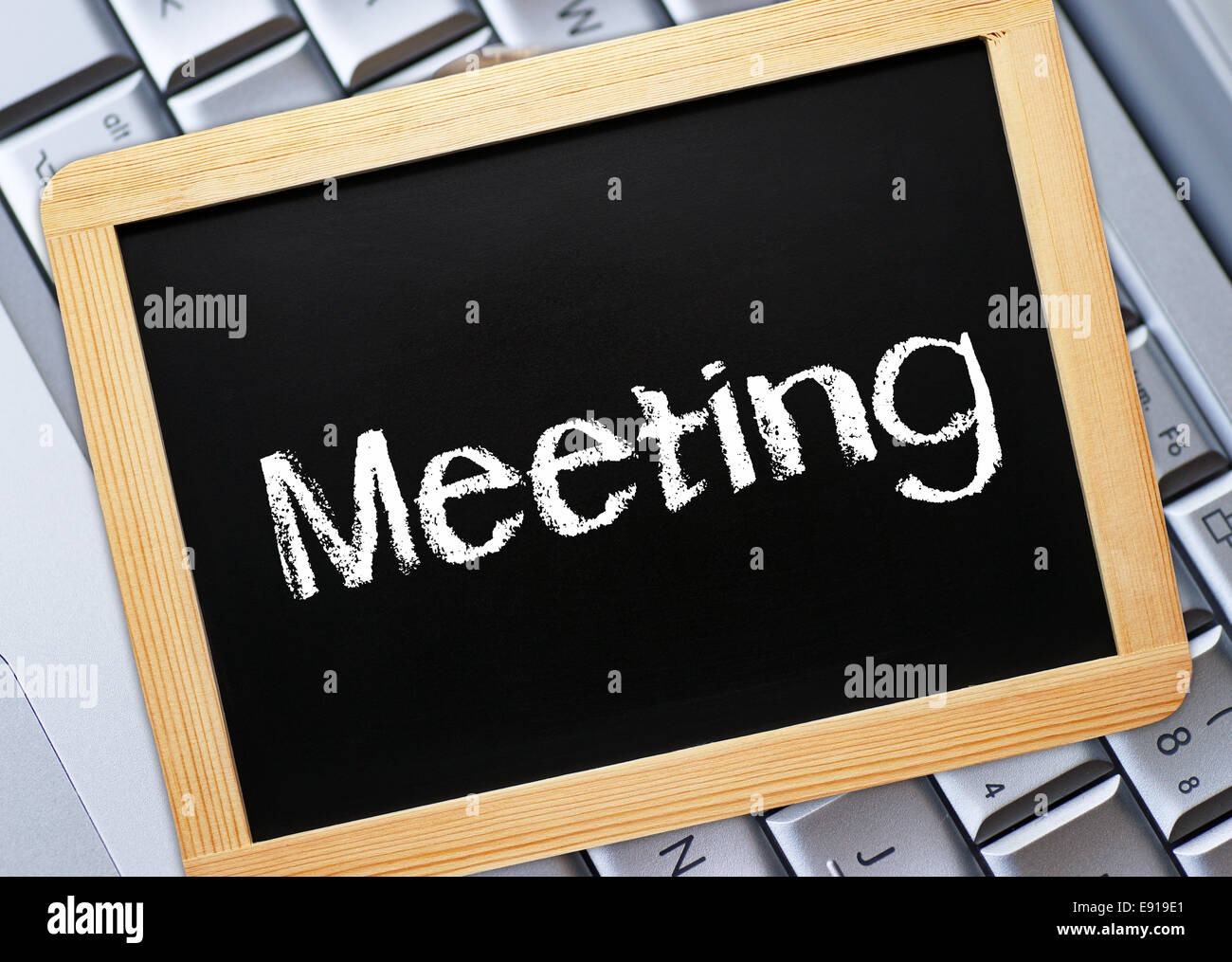 Meeting Chalkboard with Laptop Stock Photo - Alamy