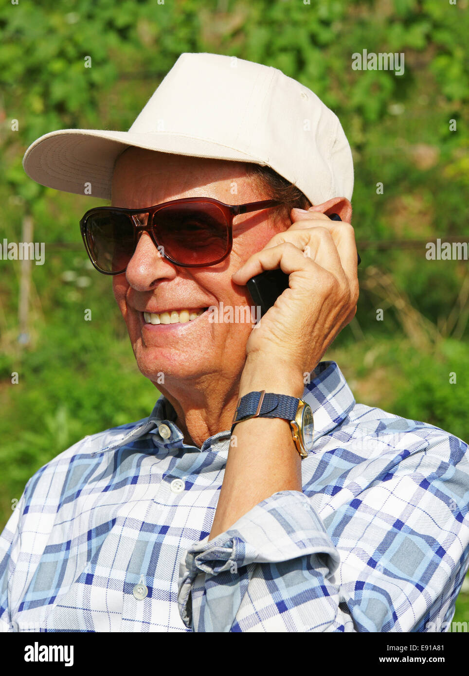 Senior Phone Call Outdoors Stock Photo - Alamy