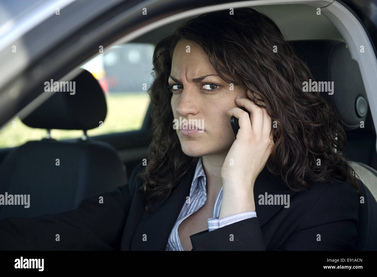 Have a call in car Stock Photo - Alamy