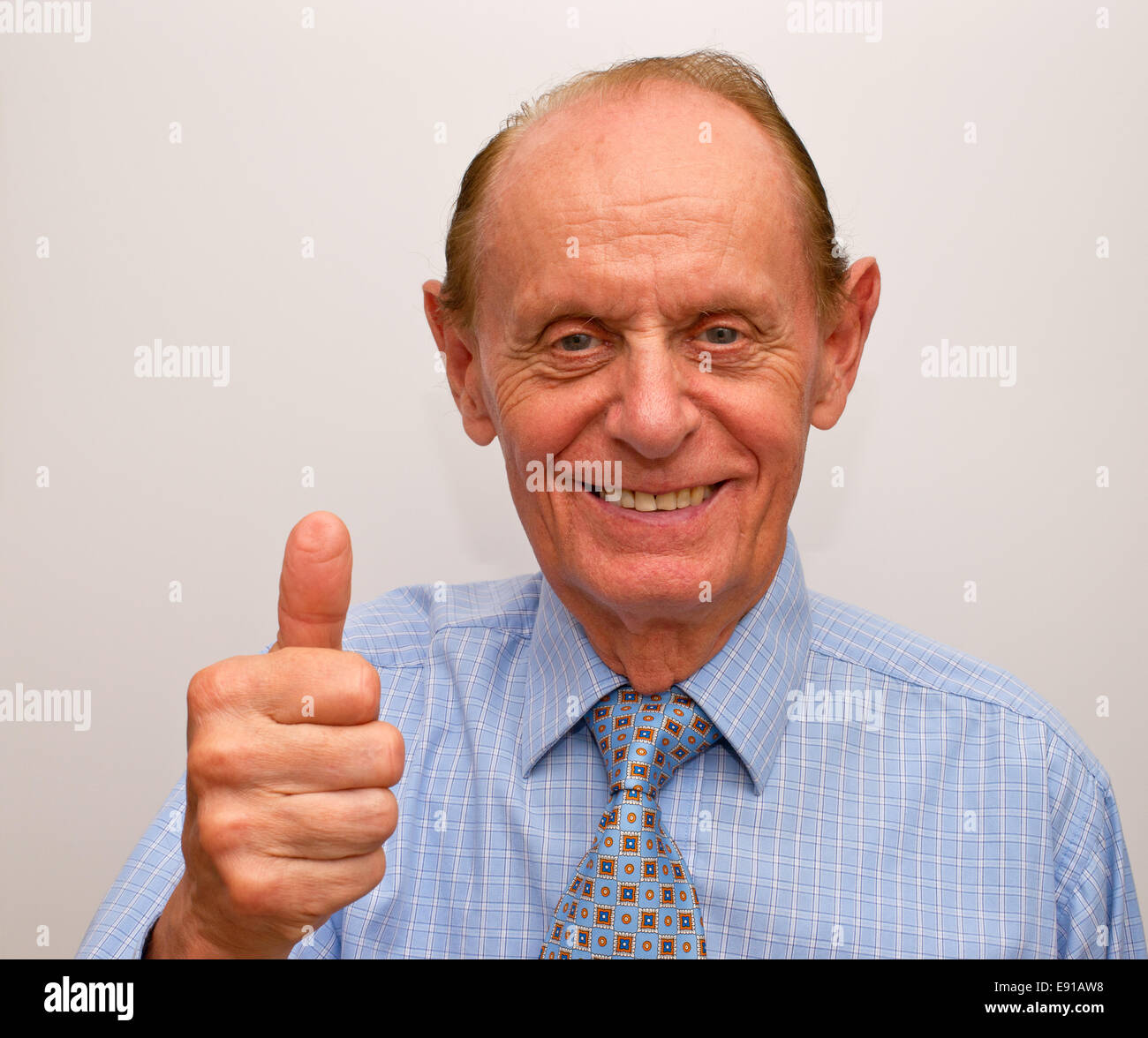 Man with thumbs up Stock Photo - Alamy