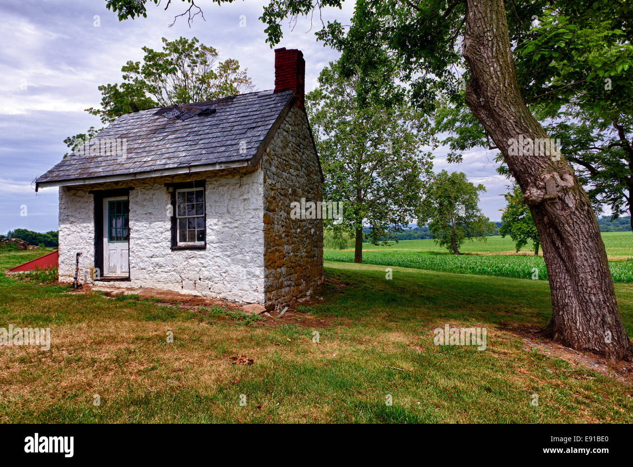 Old white house on farmland Stock Photo - Alamy