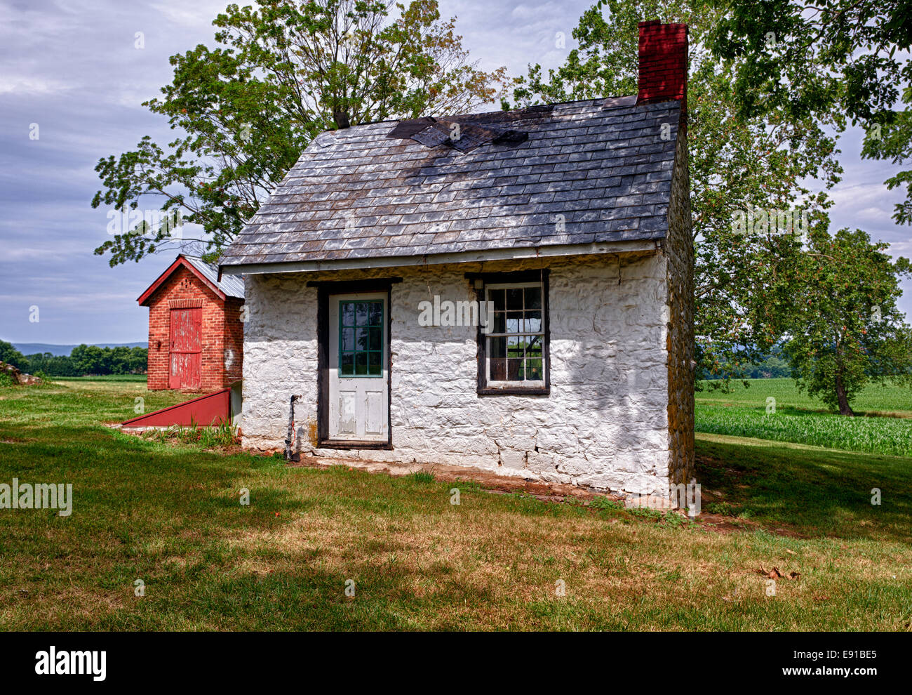 Old white house on farmland Stock Photo - Alamy