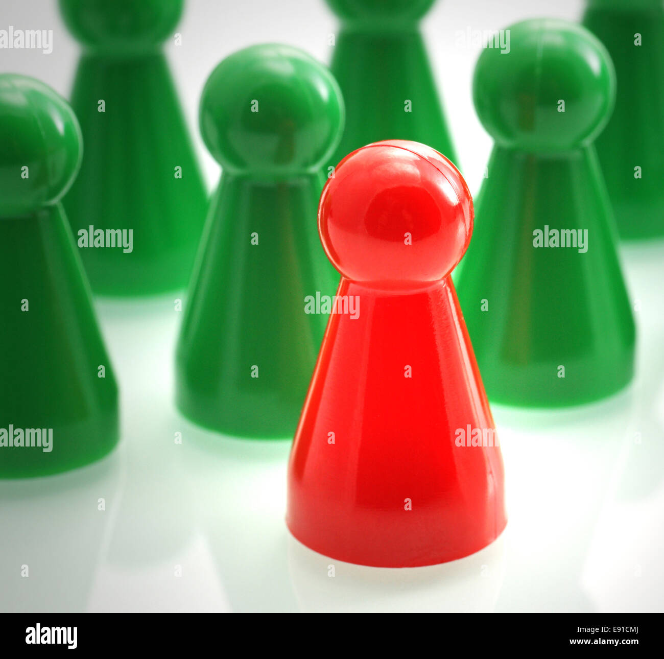 Red Leader in the Spotlight - Business Concept Stock Photo - Alamy