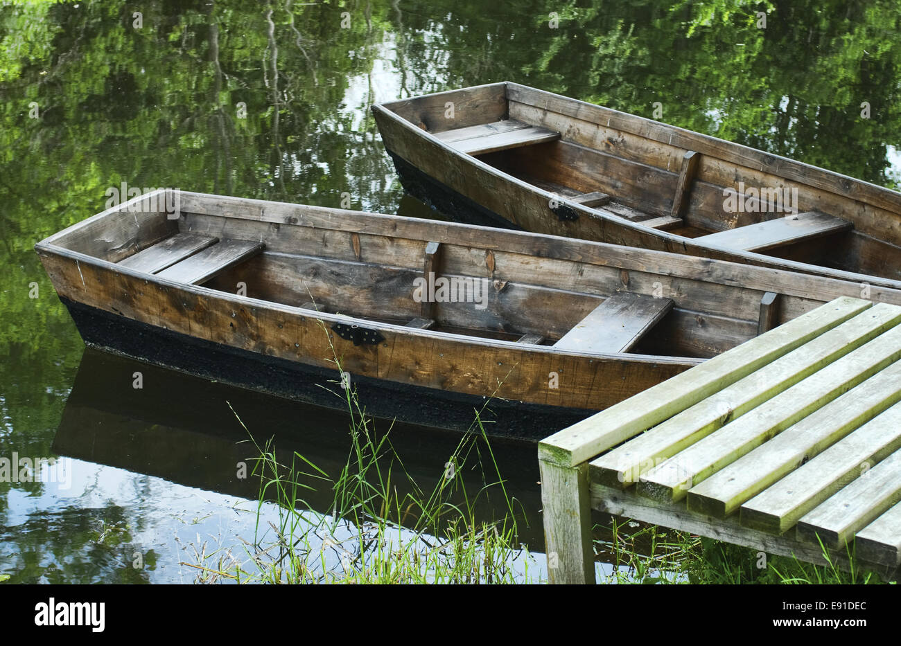Two wooden rowing boats hi-res stock photography and images - Alamy