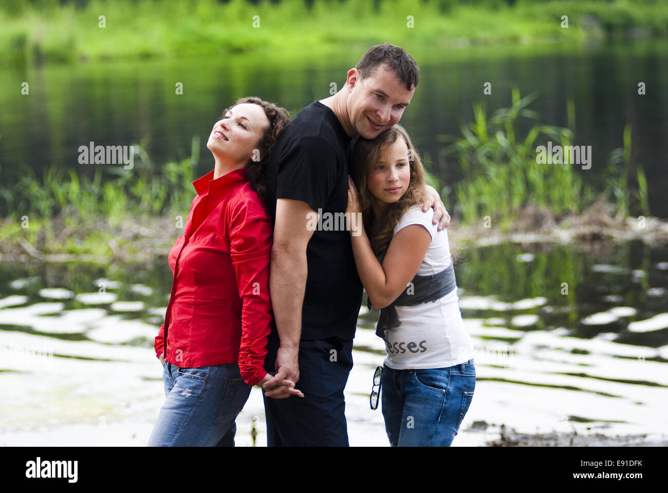 Happy family on nature Stock Photo - Alamy