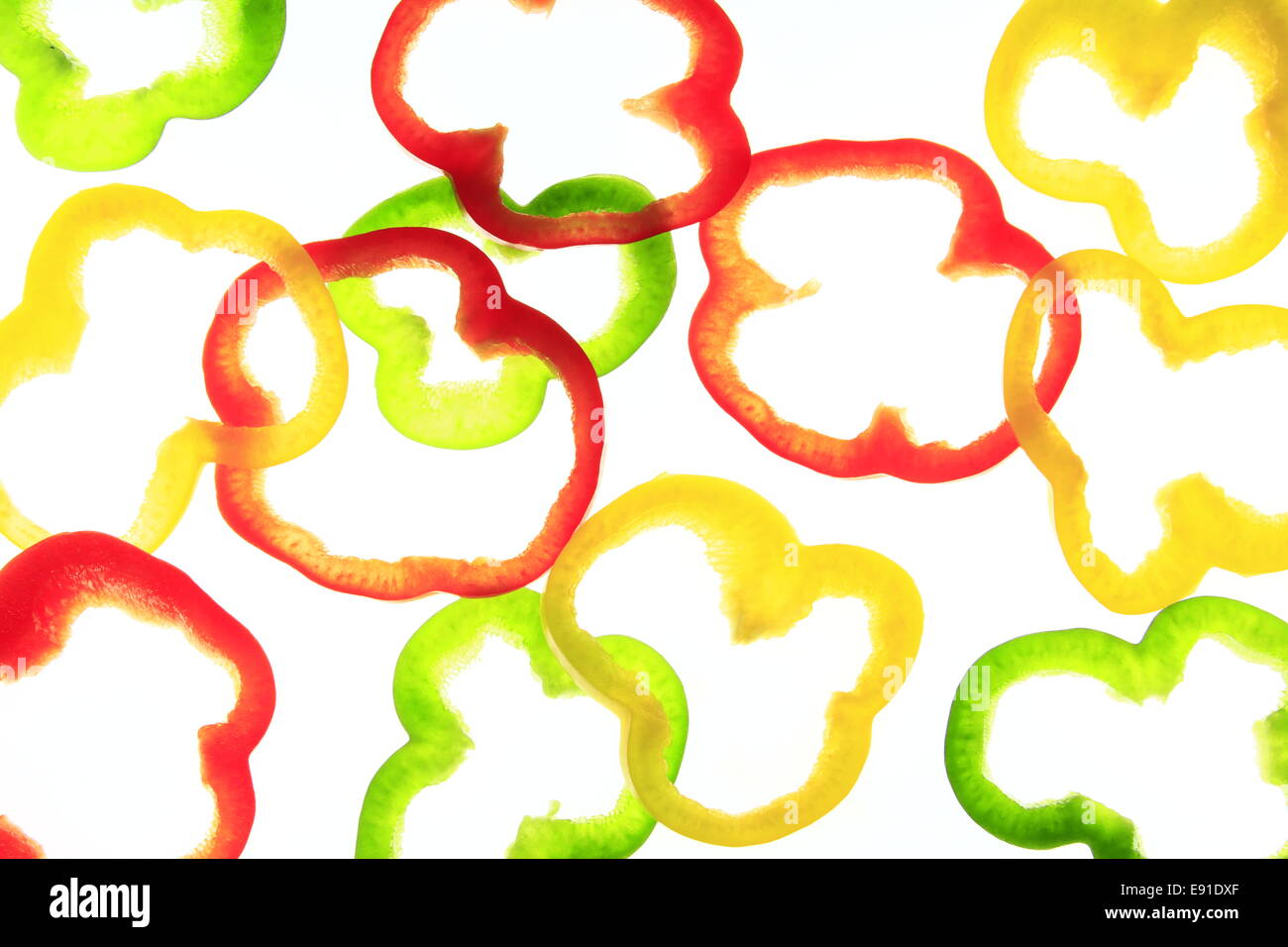 Red pepper yellow cut out slices hi-res stock photography and images ...