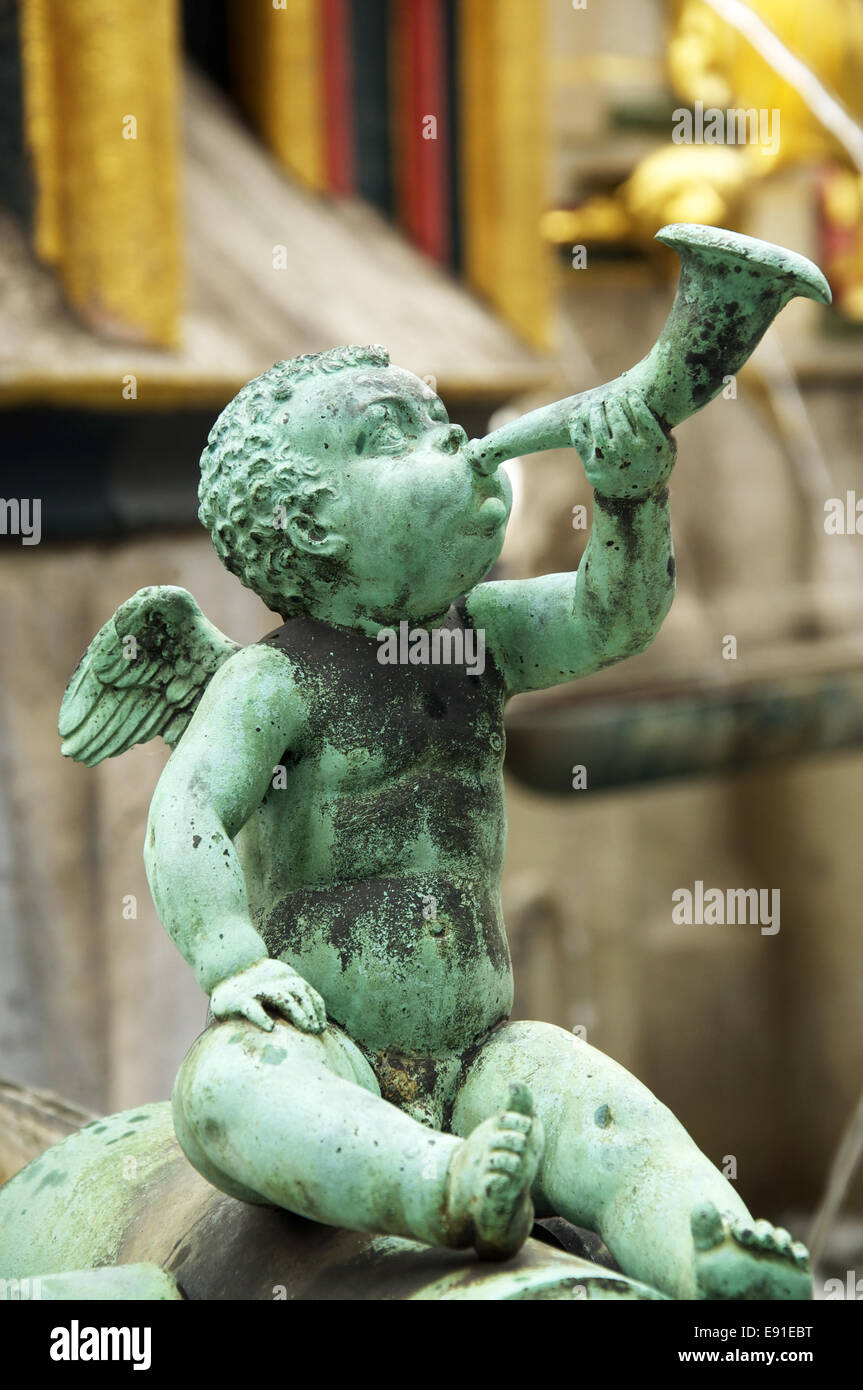 Winged angel with horn hi-res stock photography and images - Alamy