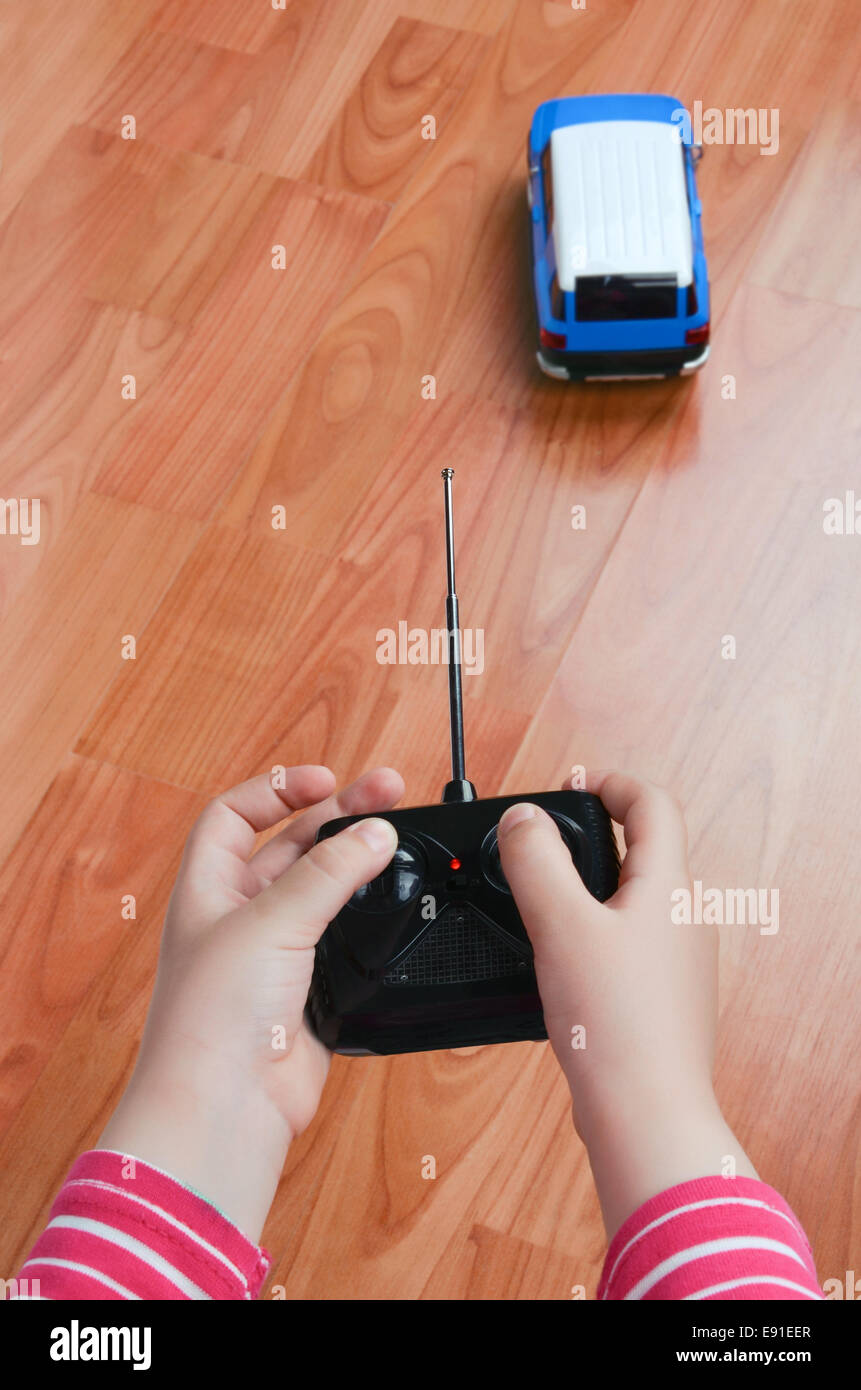 Child playing toy car Stock Photo - Alamy