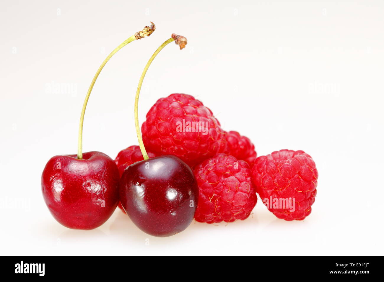 cherries and raspberries Stock Photo - Alamy