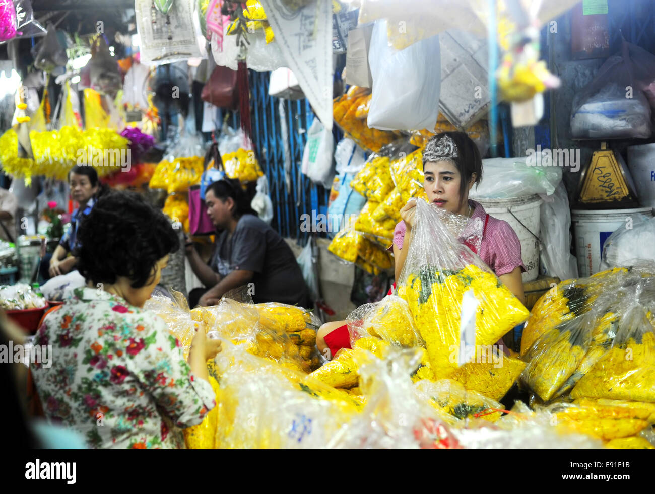 Seller at local market Stock Photo - Alamy