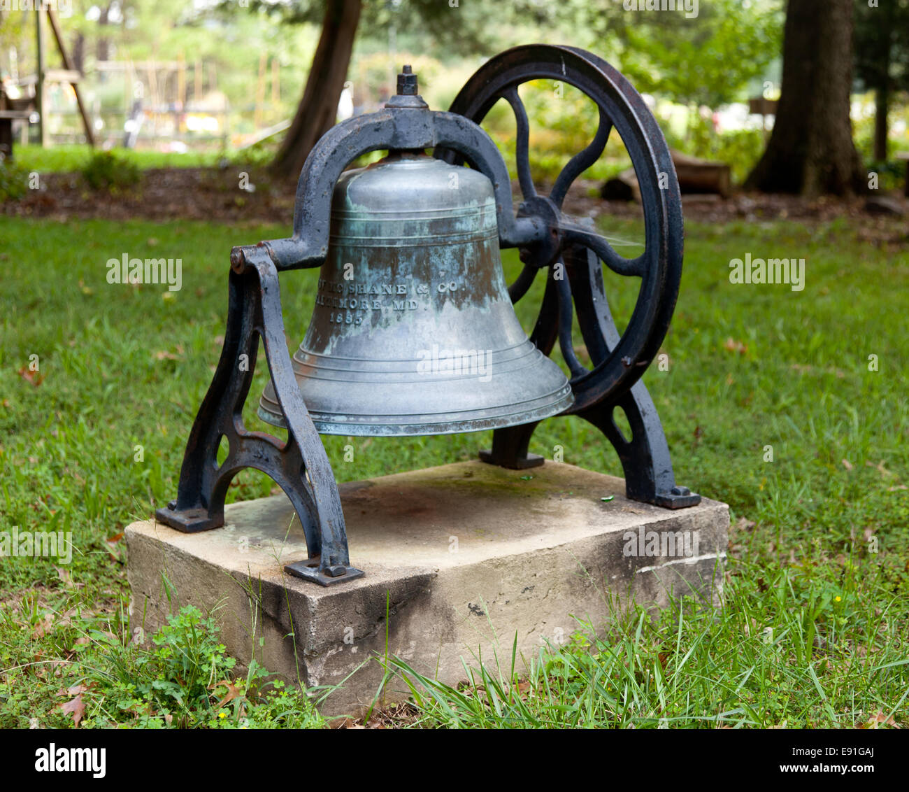 Old church bell in garden Stock Photo - Alamy