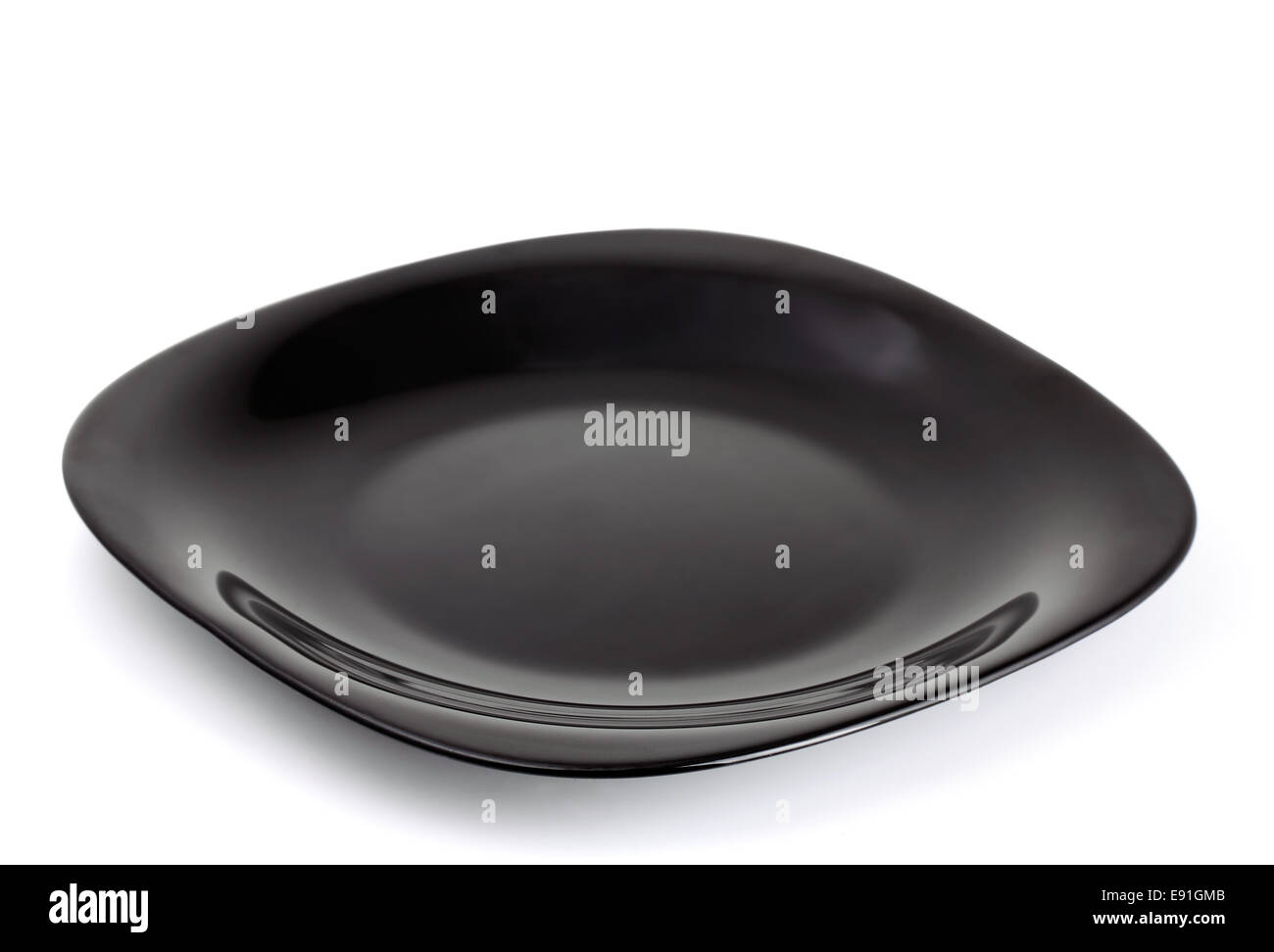 Black background food plate Cut Out Stock Images & Pictures - Alamy